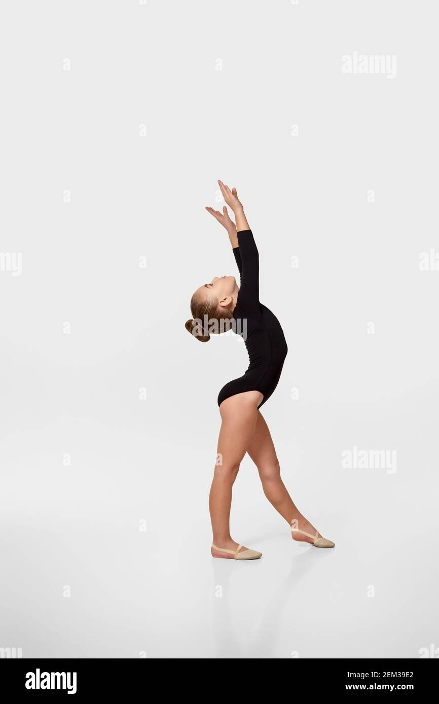 Female gymnast standing on one leg hi-res stock photography and images ...