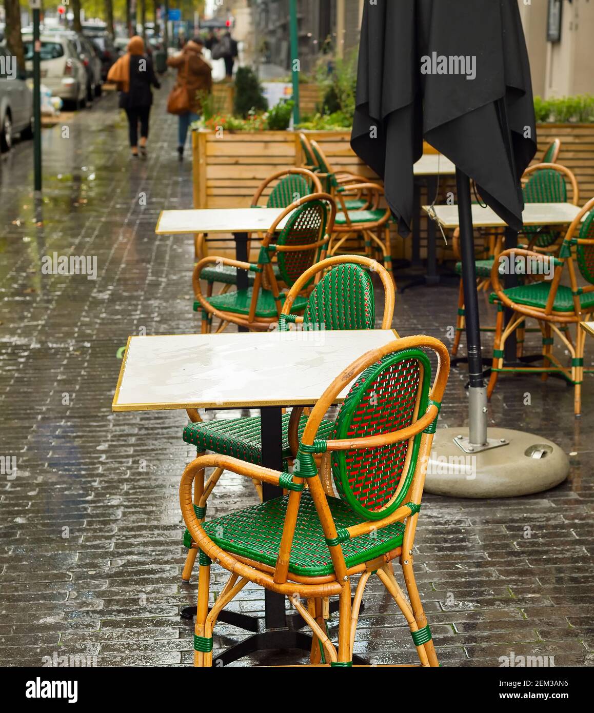 Emty street restaurant in the rainy day. Brussels, Belgium Stock Photo ...