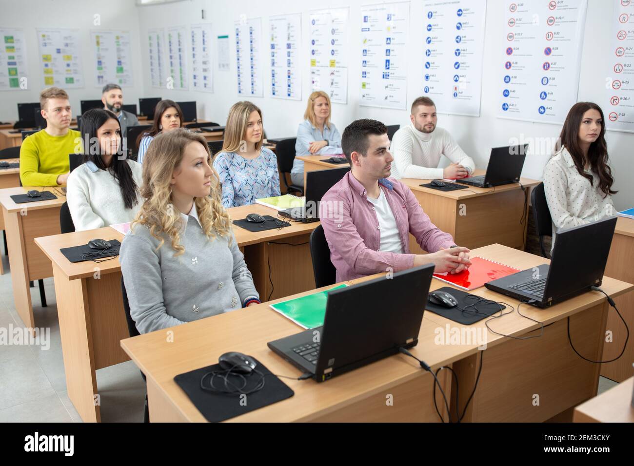 Group of students in the classroom, student concept Stock Photo - Alamy