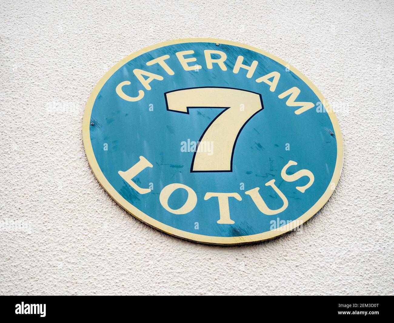 Sign for Caterham 7 and Lotus 7 cars on the side of Johns Motors, a ...