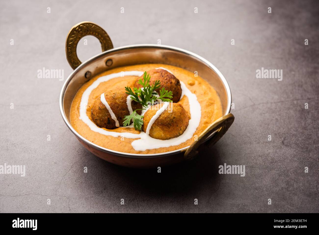 Malai Kofta Curry is an indian cuisine dish with potato cottage cheese ...