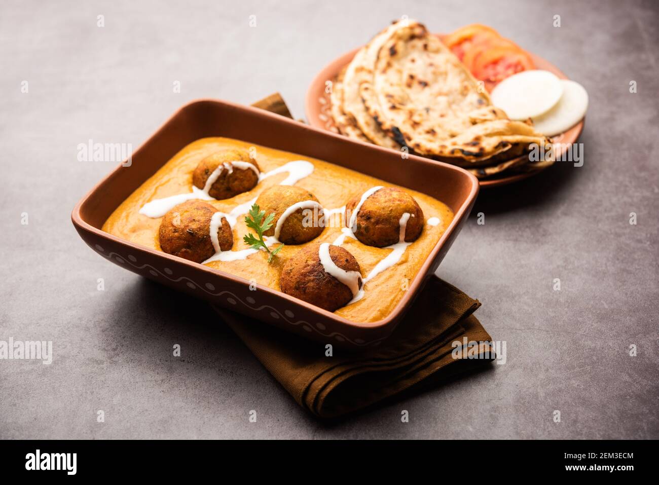Malai Kofta Curry is an indian cuisine dish with potato cottage cheese ...