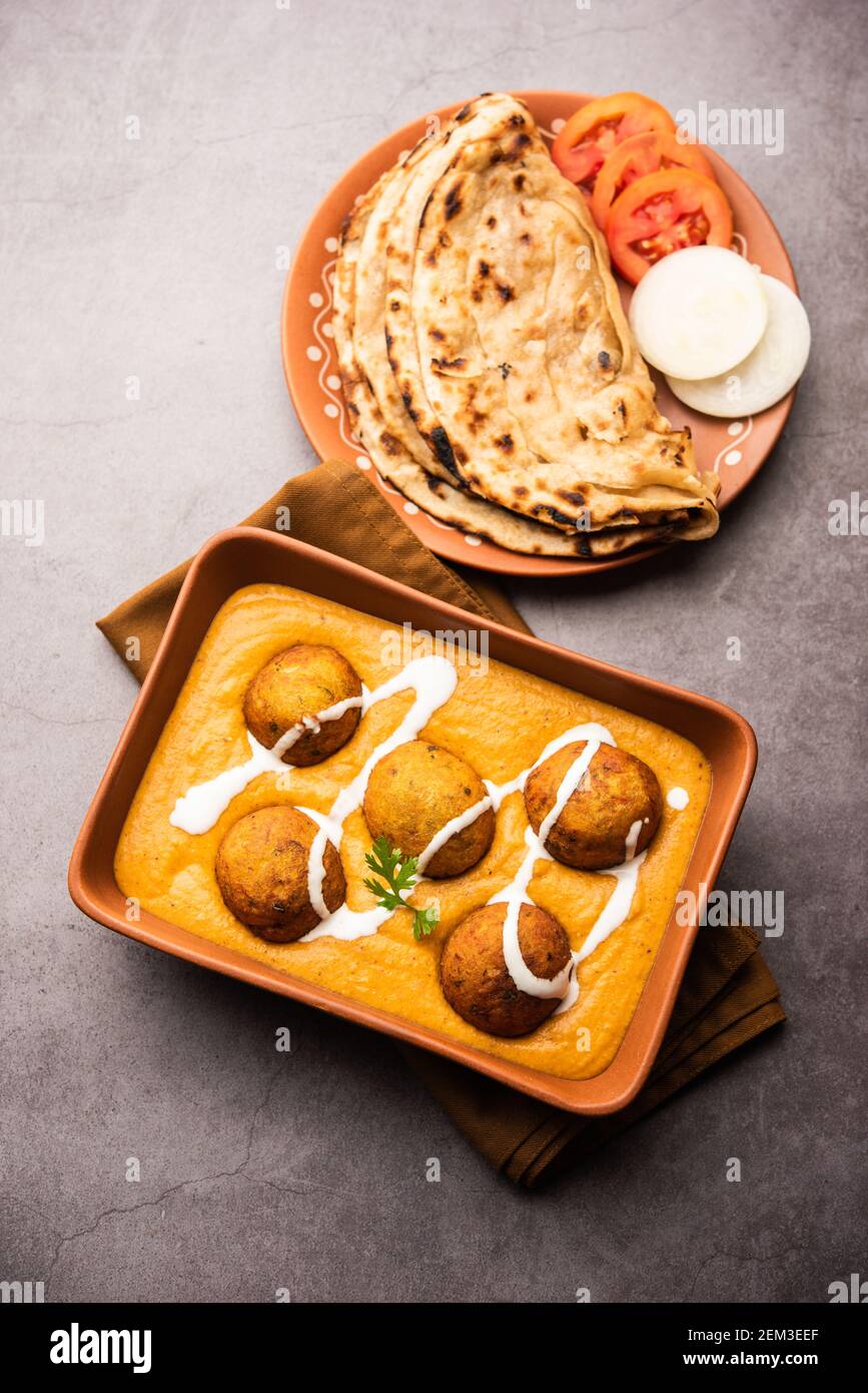 Malai Kofta Curry is an indian cuisine dish with potato cottage cheese ...