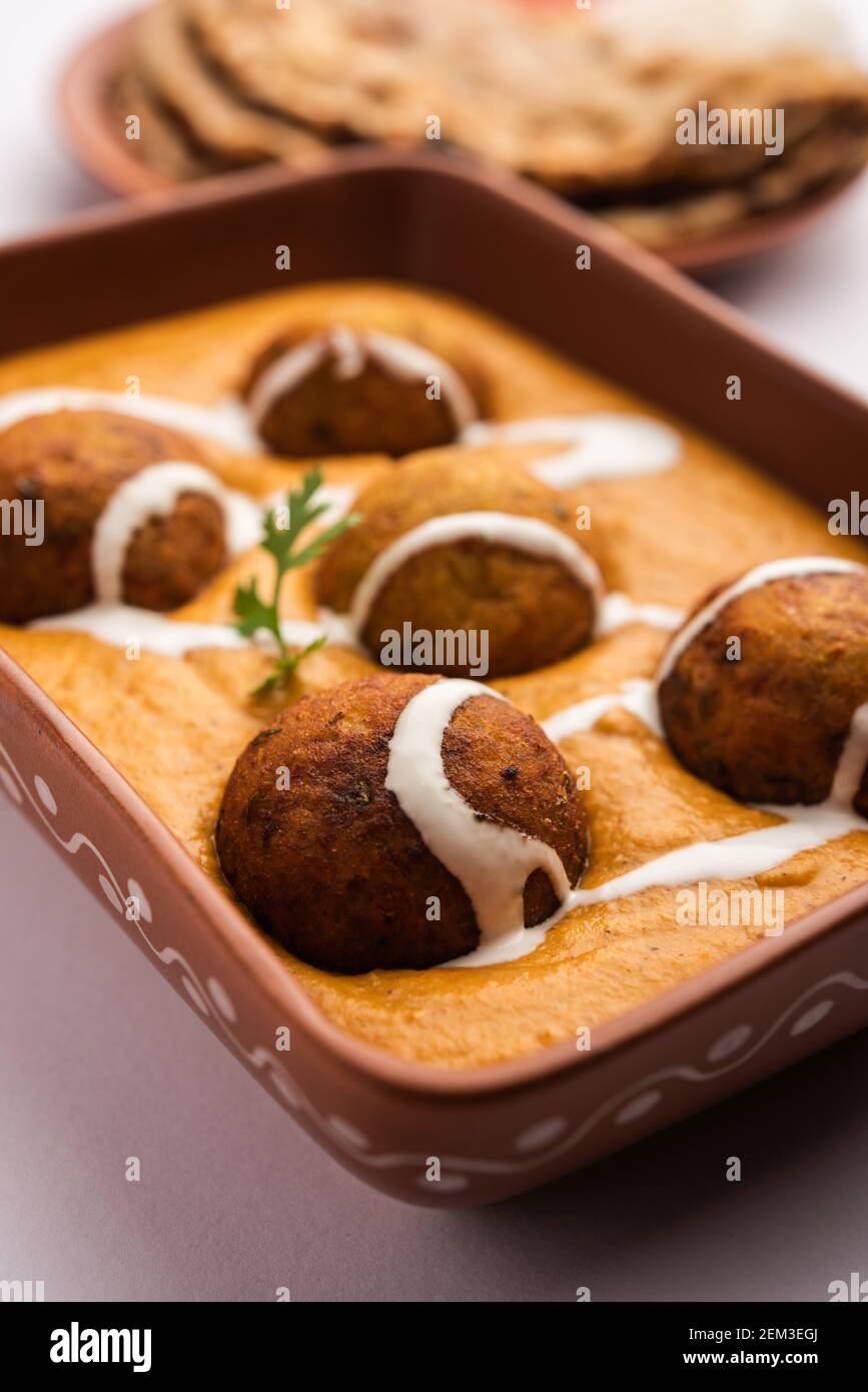 Malai Kofta Curry is an indian cuisine dish with potato cottage cheese ...