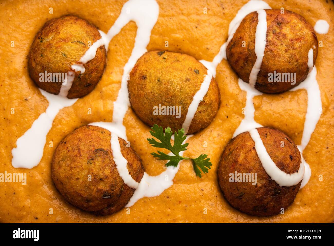 Malai Kofta Curry is an indian cuisine dish with potato cottage cheese ...