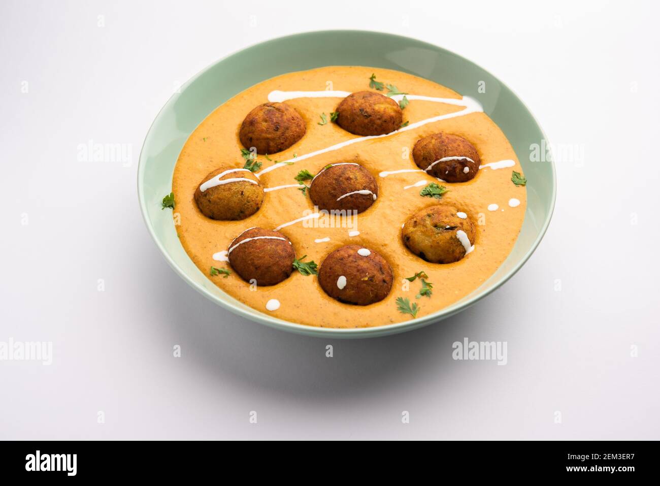 Malai Kofta Curry is an indian cuisine dish with potato cottage cheese ...