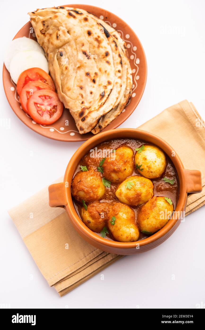 Tasty Dum Aloo or whole potatoes spicy curry is a popular main course ...