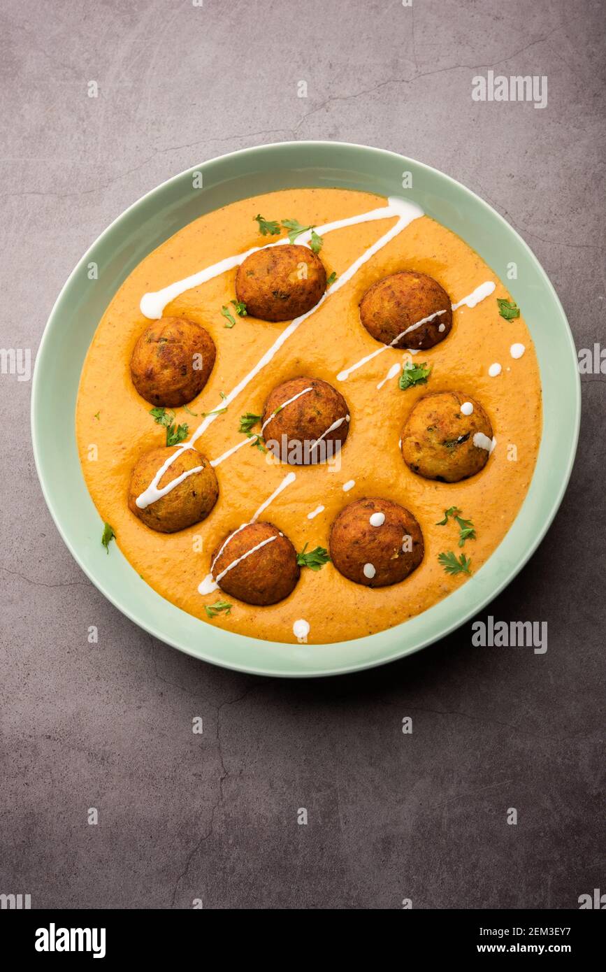 Malai Kofta Curry is an indian cuisine dish with potato cottage cheese ...