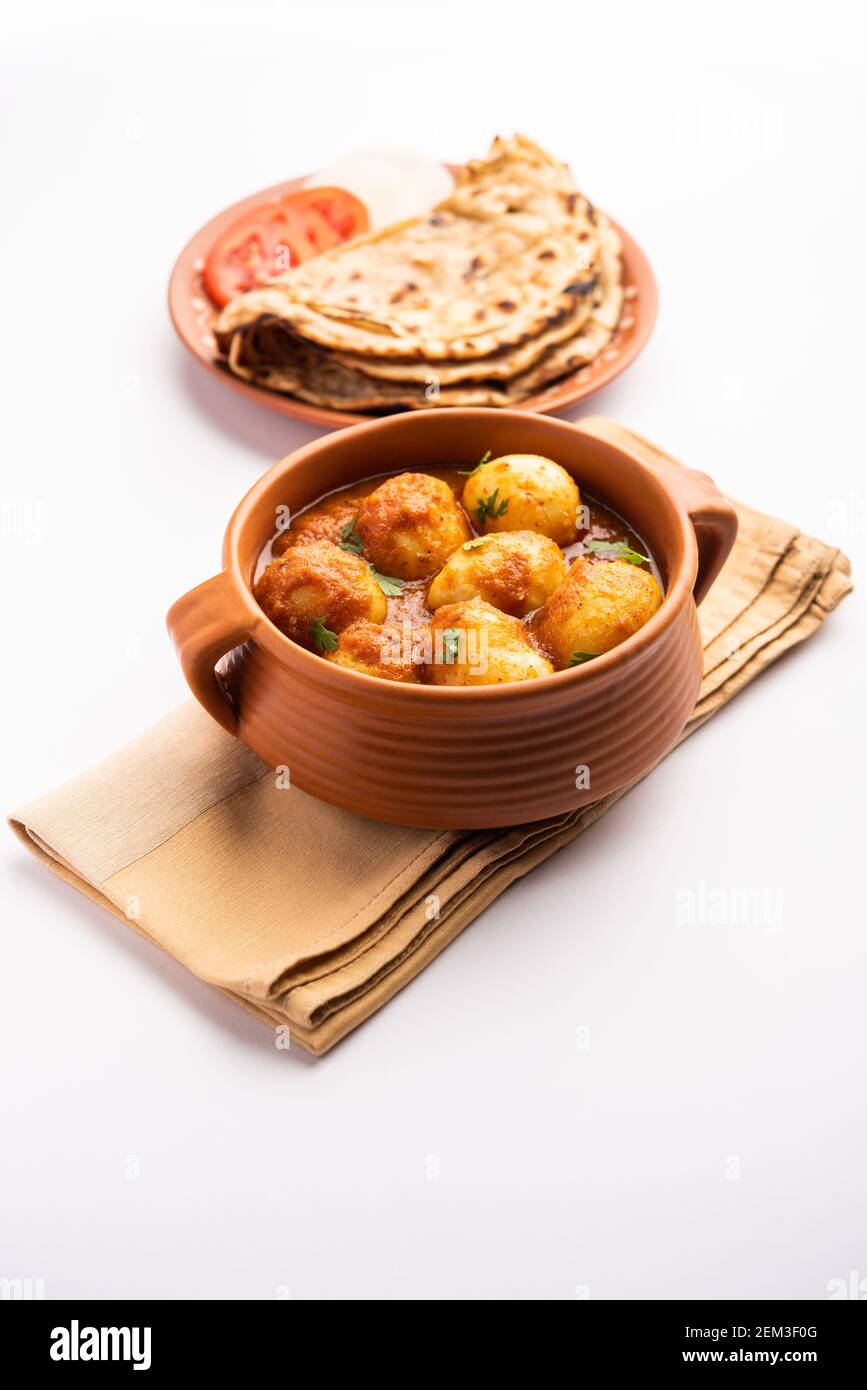Tasty Dum Aloo or whole potatoes spicy curry is a popular main course ...