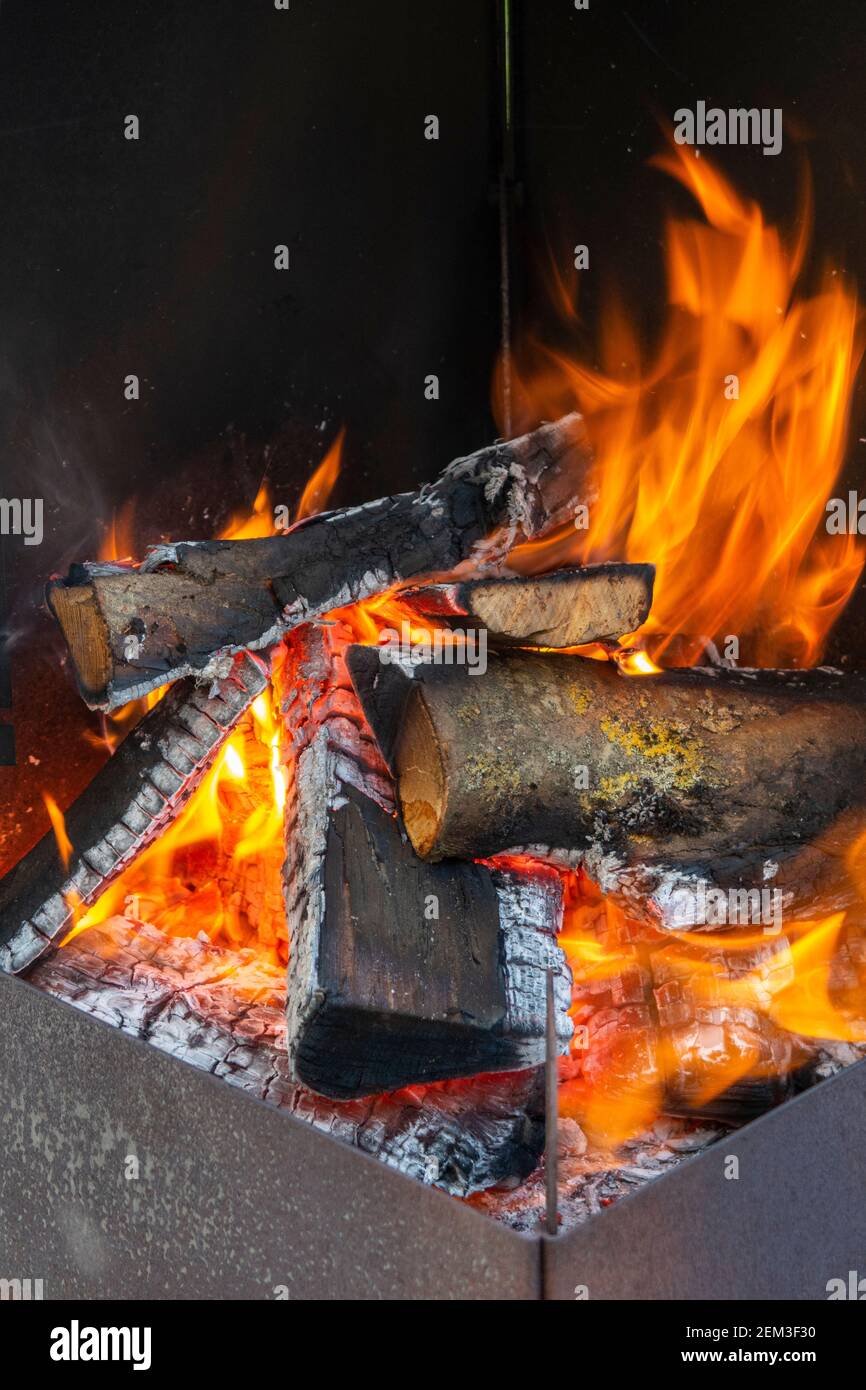 Photograph of logs burning on a fire pit Photo Phil Wilkinson Stock ...