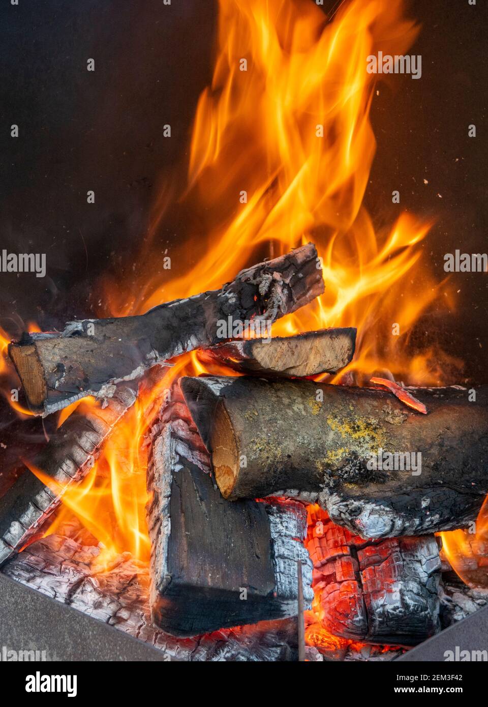 Photograph of logs burning on a fire pit Photo Phil Wilkinson Stock ...