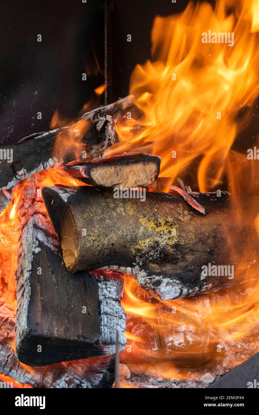 Photograph of logs burning on a fire pit Photo Phil Wilkinson Stock ...
