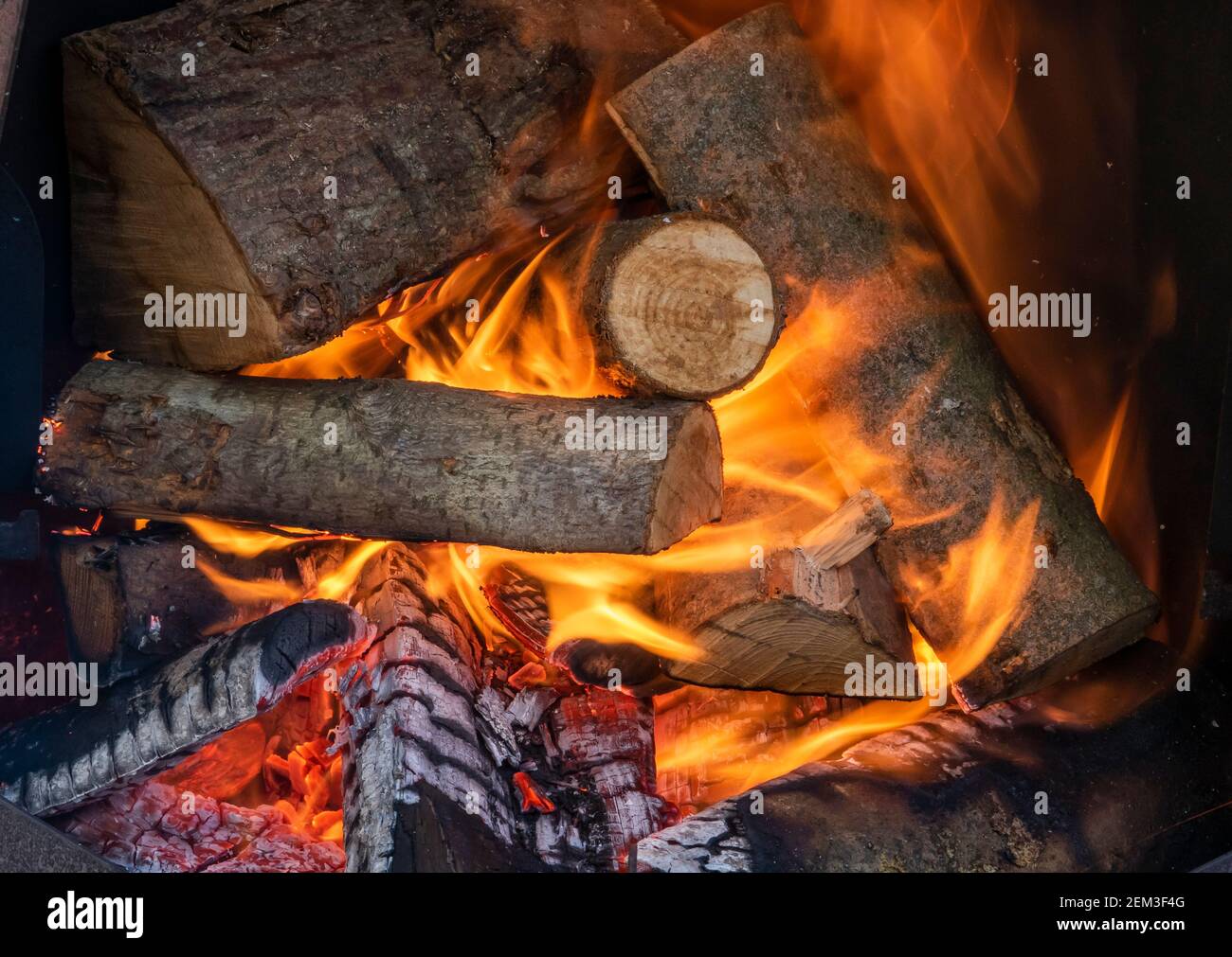 Photograph of logs burning on a fire pit Photo Phil Wilkinson Stock ...