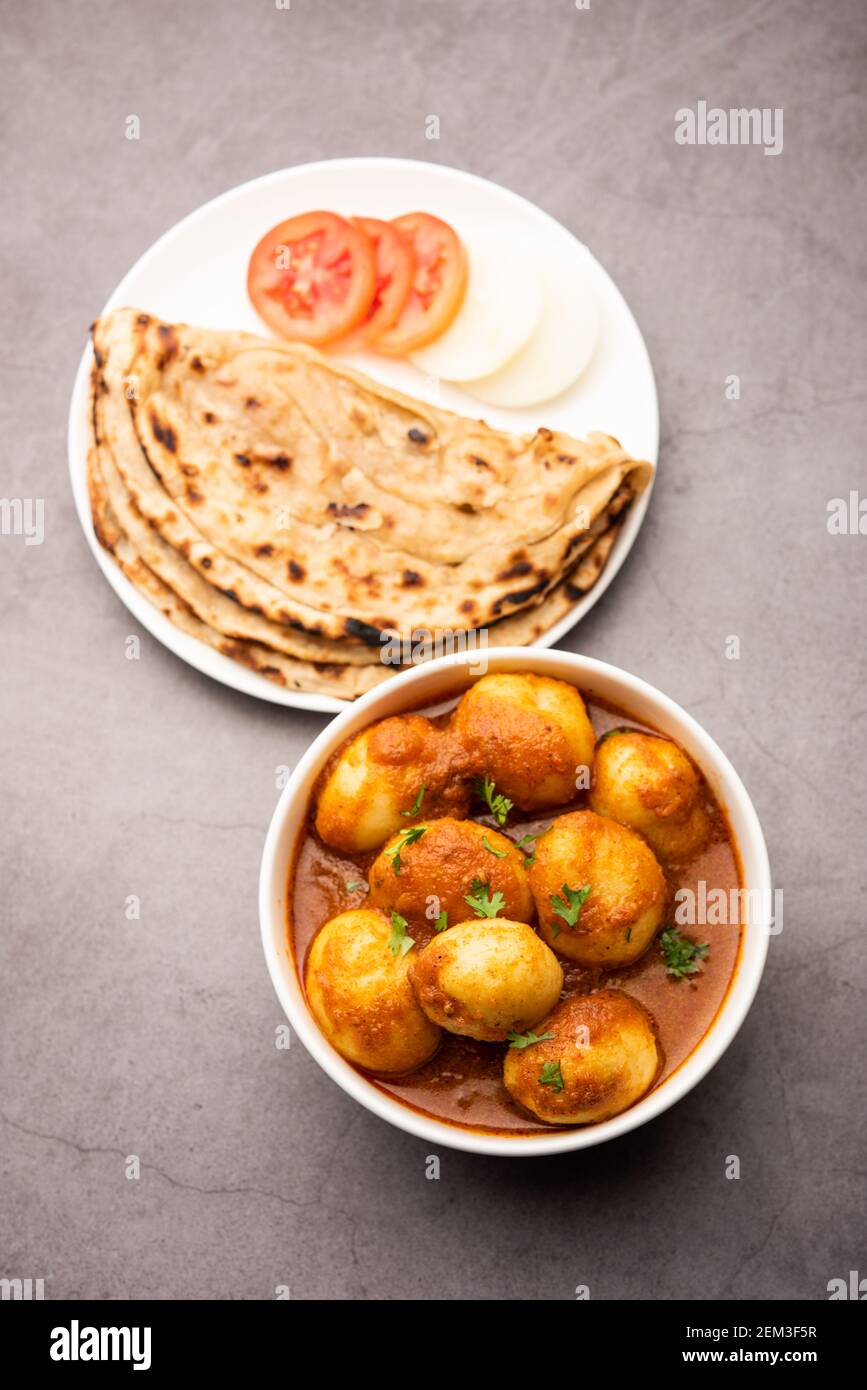 Tasty Dum Aloo or whole potatoes spicy curry is a popular main course ...