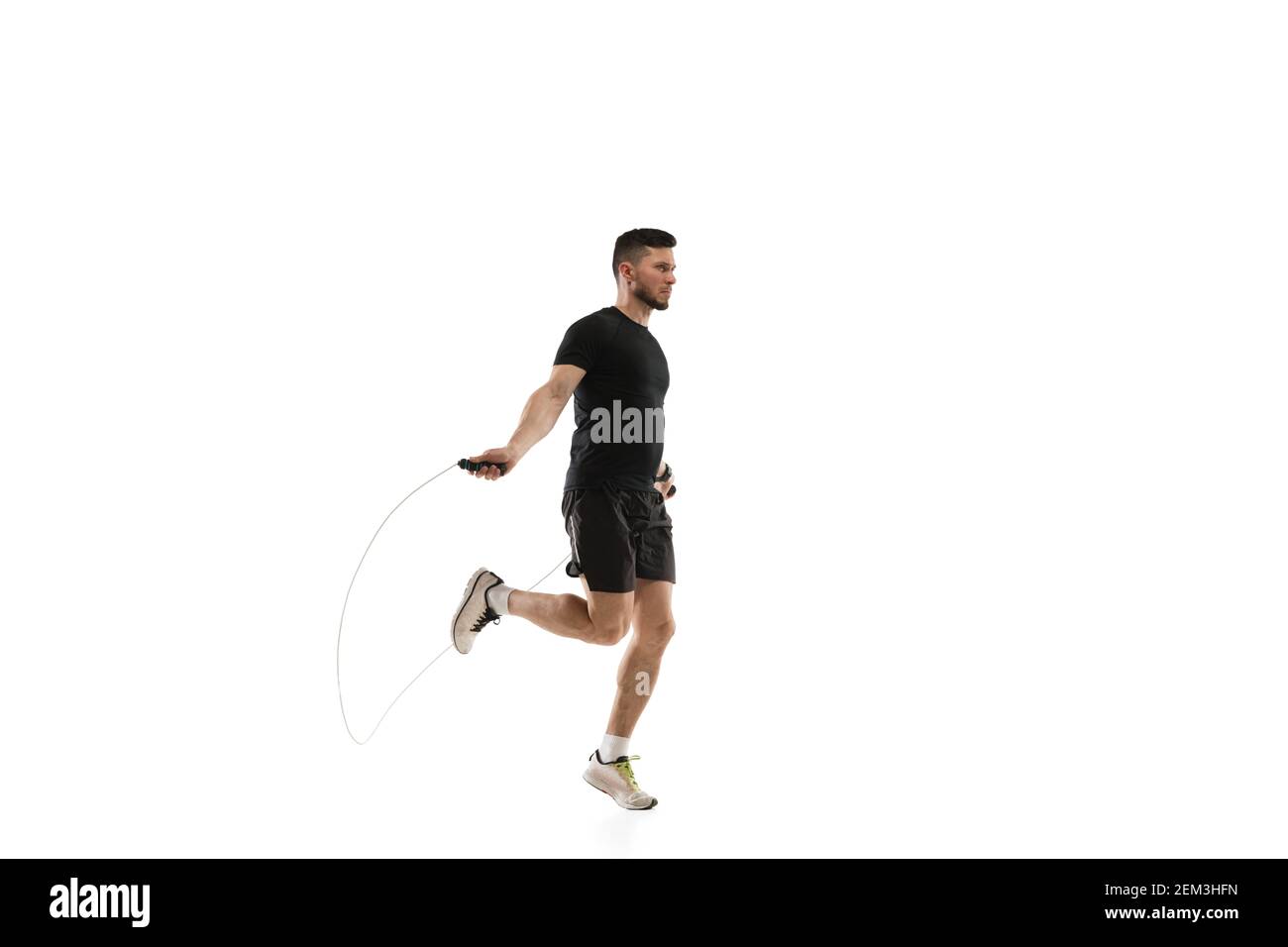 Jumping. Caucasian professional sportsman training isolated on white ...