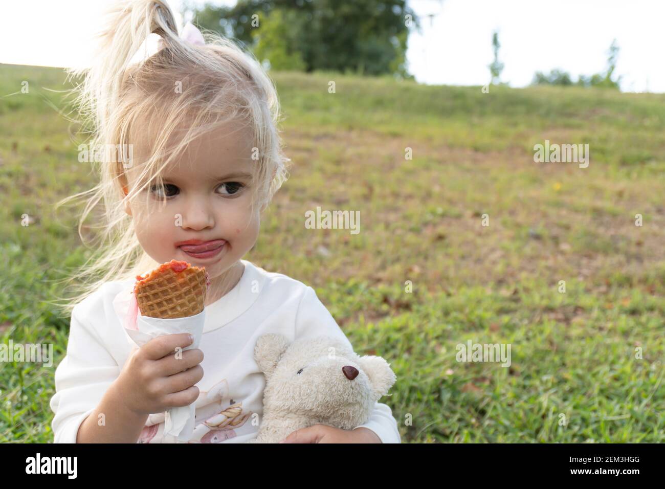 Licking ice cream hi-res stock photography and images - Alamy