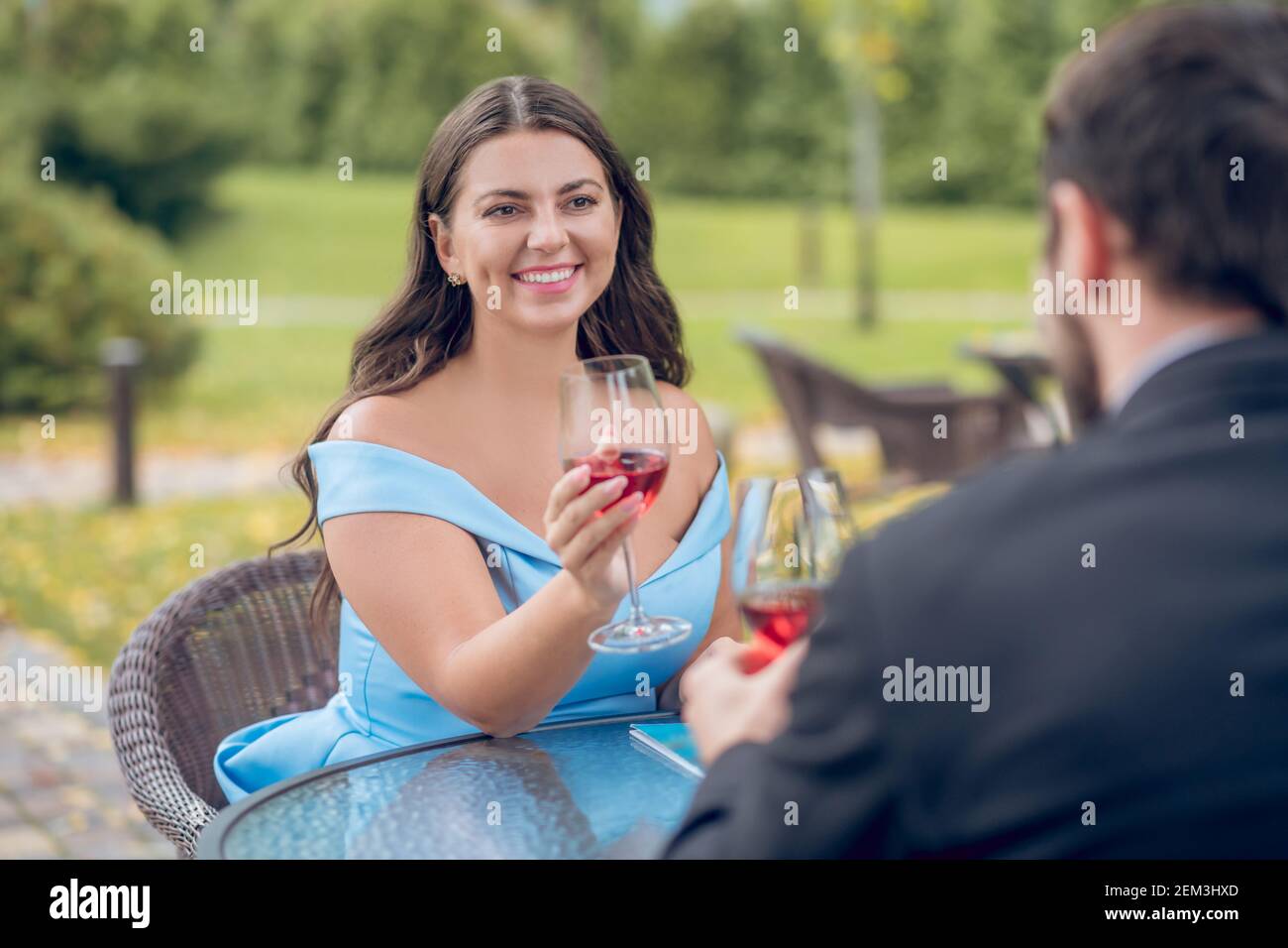 Man raising glasses hi-res stock photography and images - Alamy