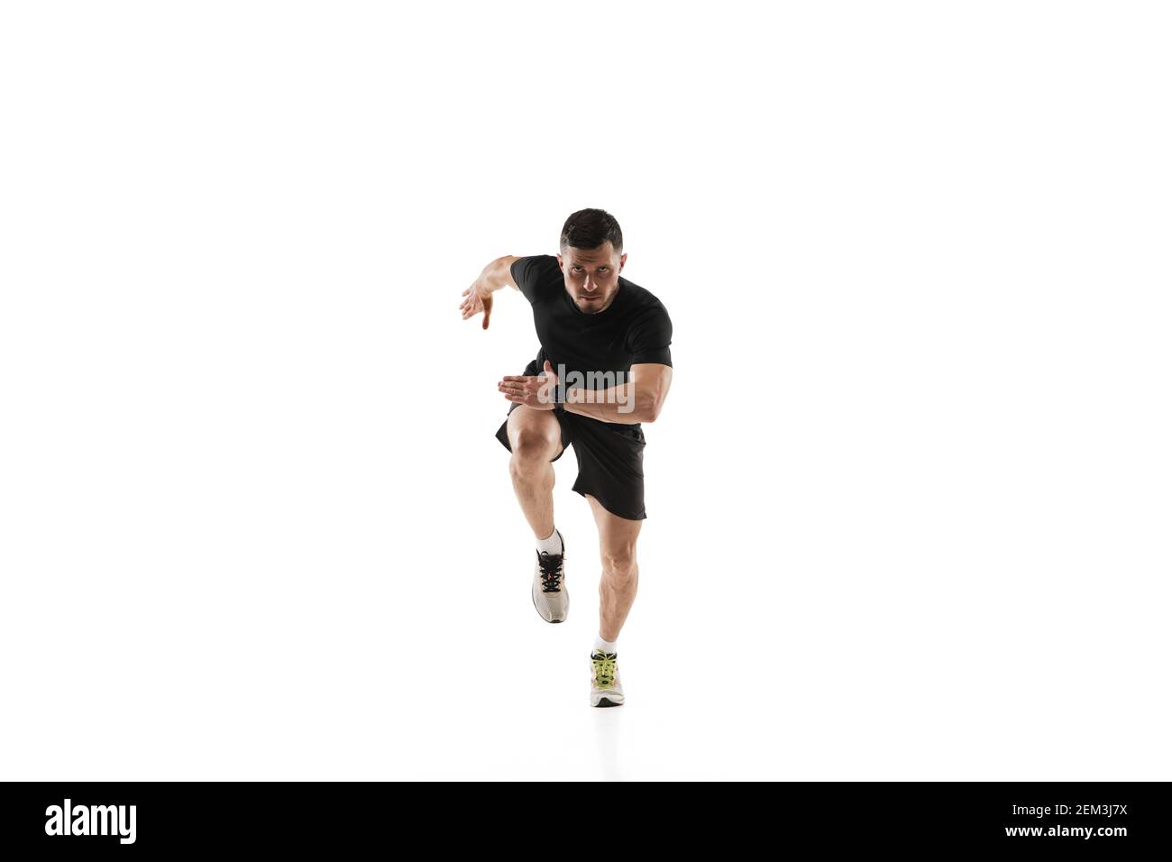 Starting. Caucasian professional sportsman training isolated on white ...