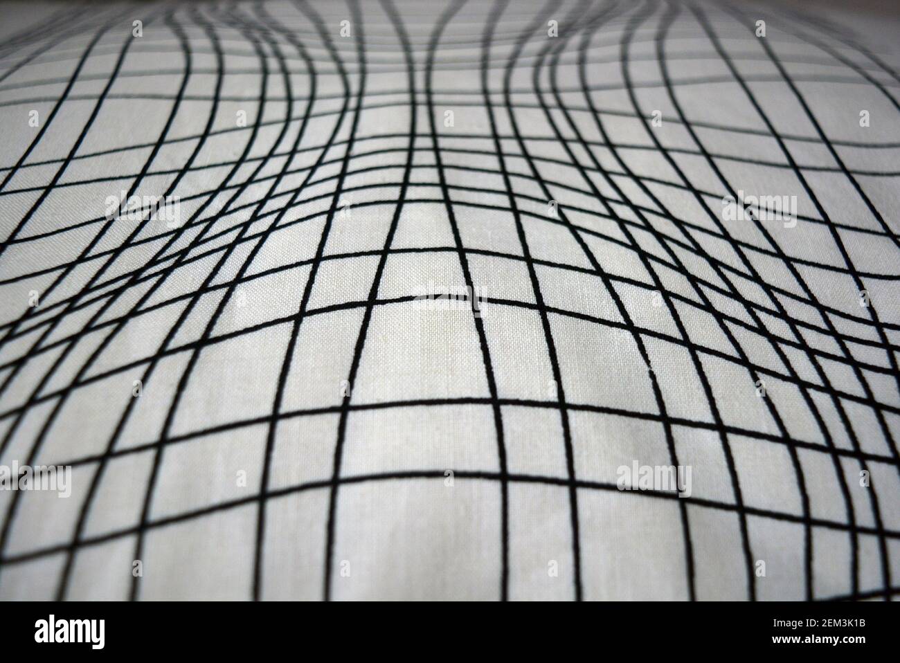 Ivory cotton fabric with geometric patterns printed on it. Unusual ...