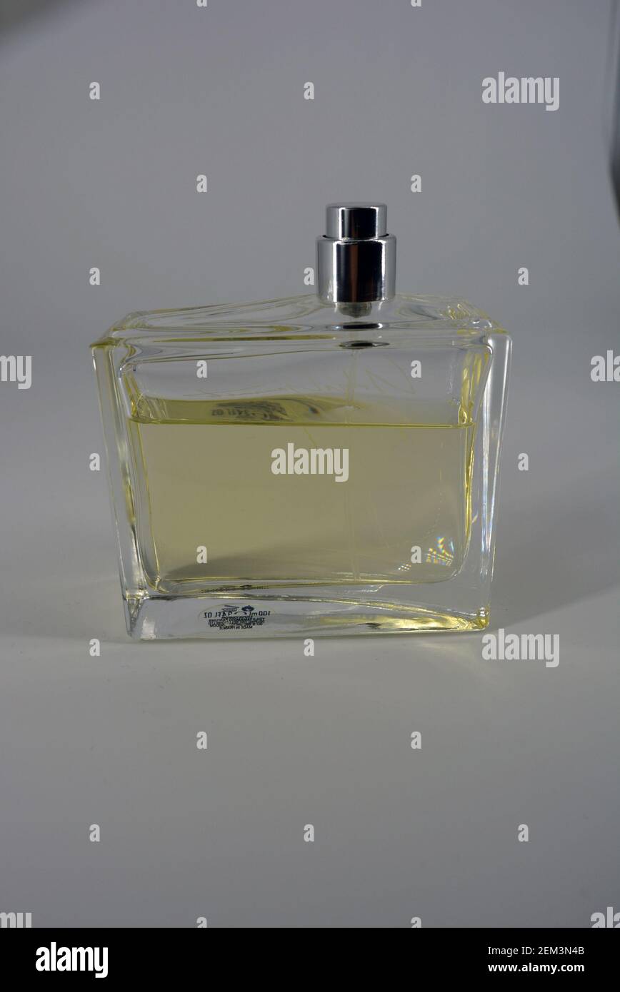 Beautiful and unusual transparent bottle of elegant female perfume with ...
