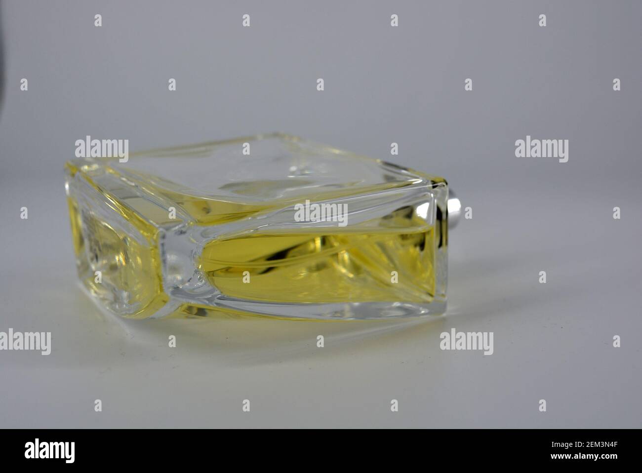 Beautiful and unusual transparent bottle of elegant female perfume with ...