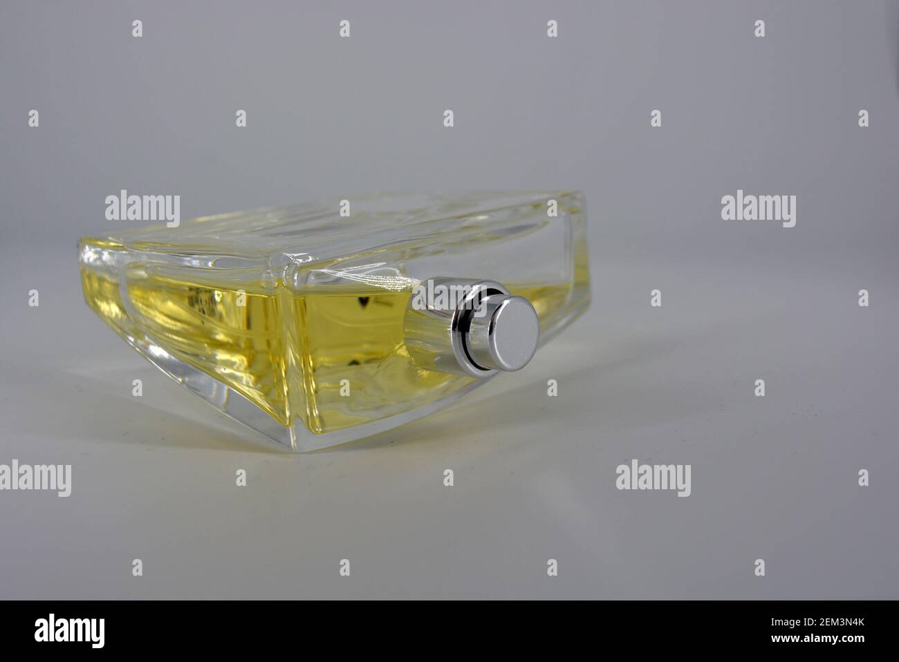 Beautiful and unusual transparent bottle of elegant female perfume with ...
