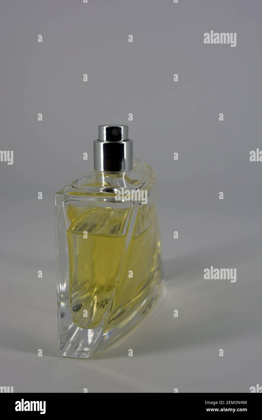 Beautiful and unusual transparent bottle of elegant female perfume with ...