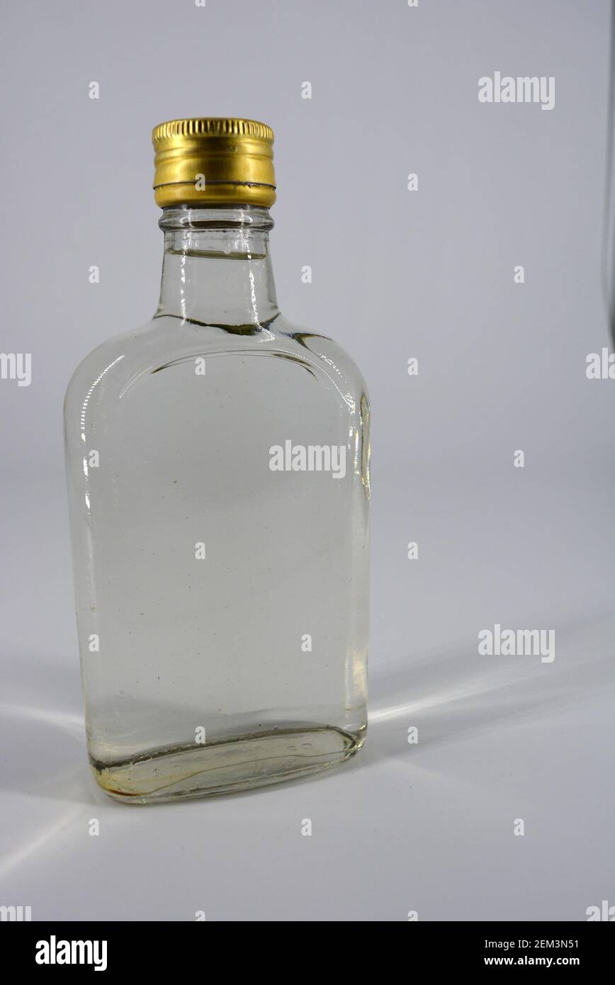 Classic glass bottle of 500 ml with swelling neck and gilded lid for ...