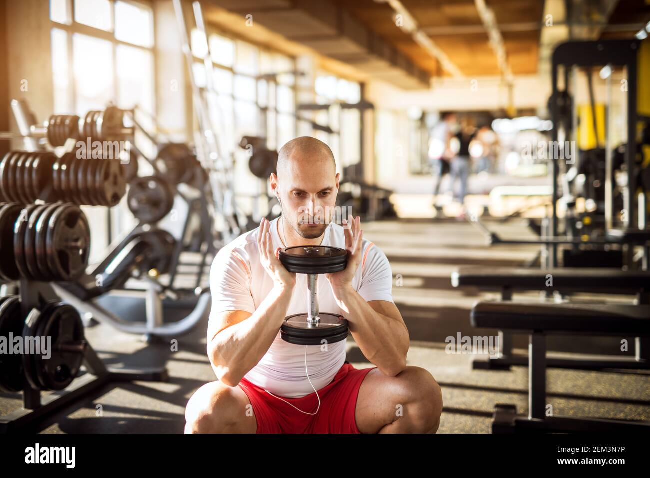 Portrait close up view of strong motivated and focused muscular bald ...