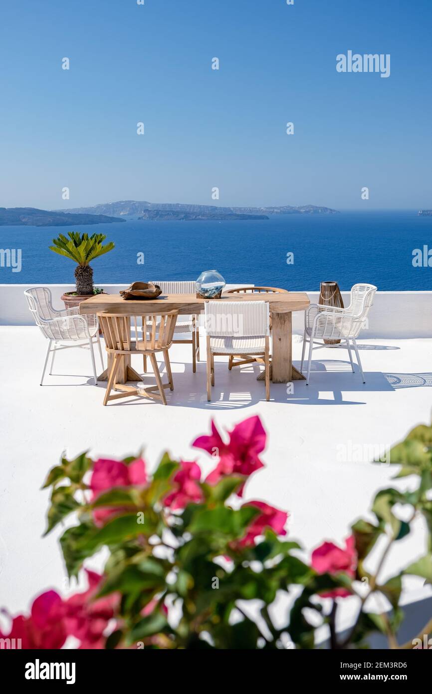 Oia village Santorini with blue domes and white washed house during ...