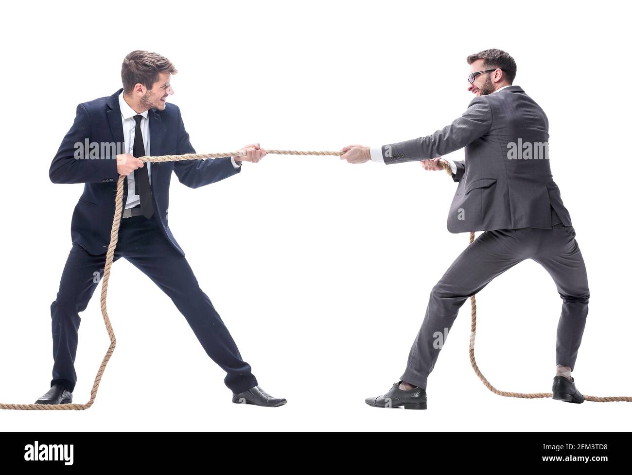 full length . two smiling businessmen pulling the rope Stock Photo - Alamy