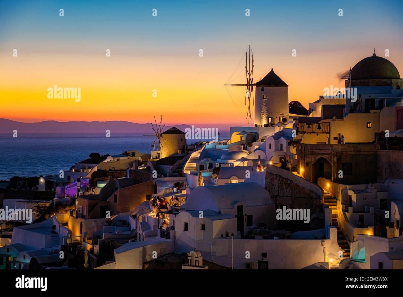 Oia village Santorini with blue domes and white washed house during ...