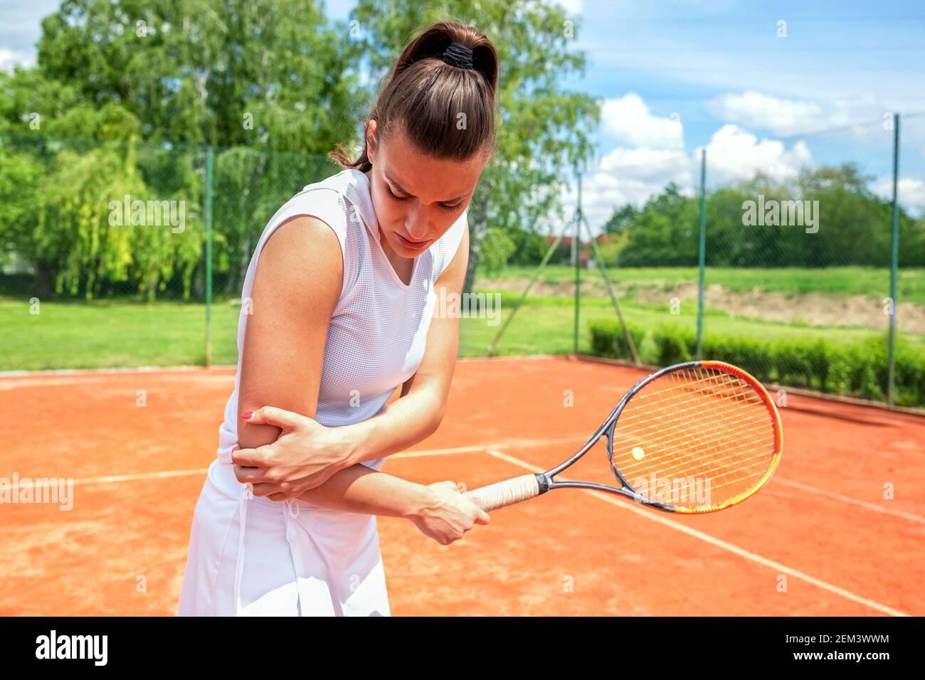 Arm injury during tennis practice, concept of tennis injuries Stock ...