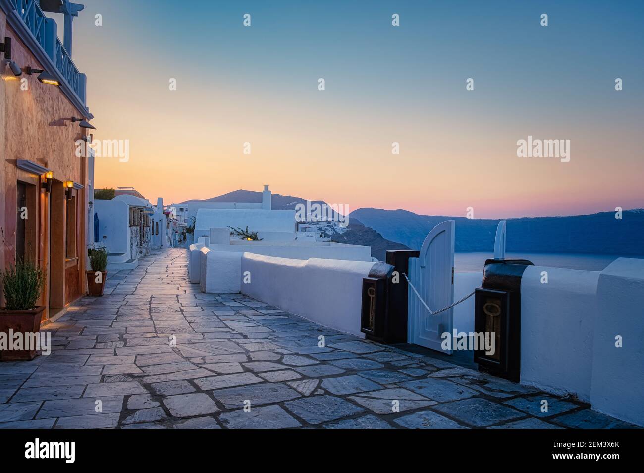 Oia village Santorini with blue domes and white washed house during ...