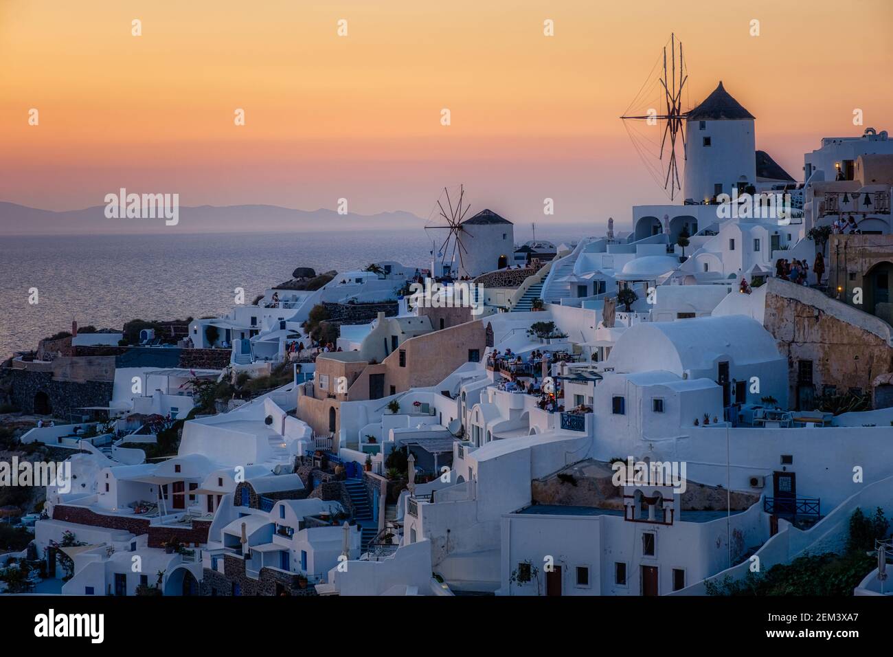 Oia village Santorini with blue domes and white washed house during ...