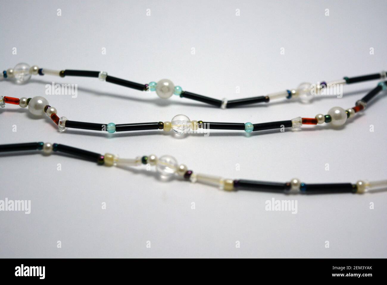 Female beads sets made of beads, large beads and located on a white ...