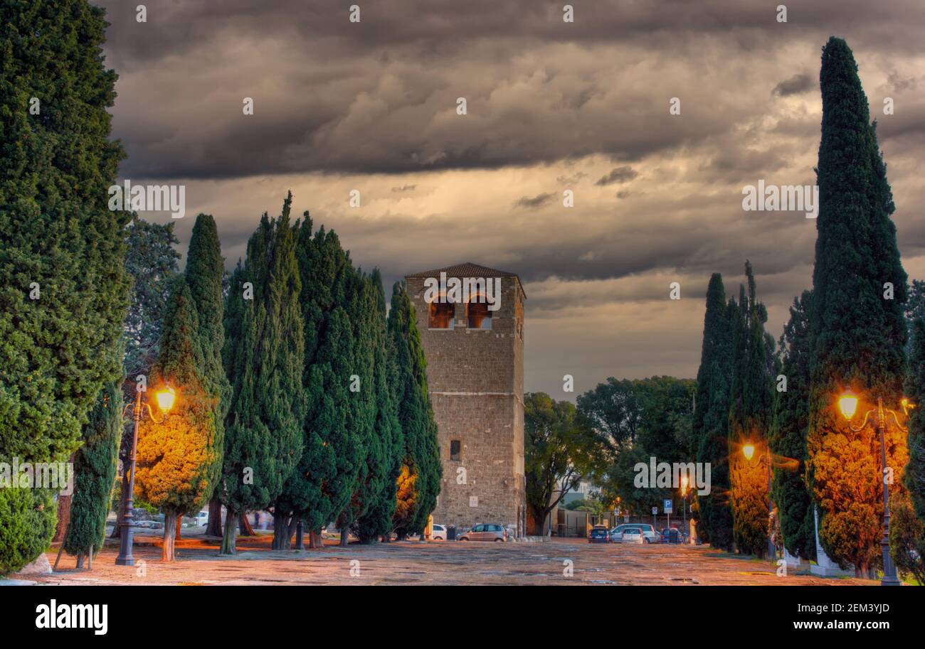 Tower of the St. Giusto basilica at sunset in Trieste Stock Photo - Alamy