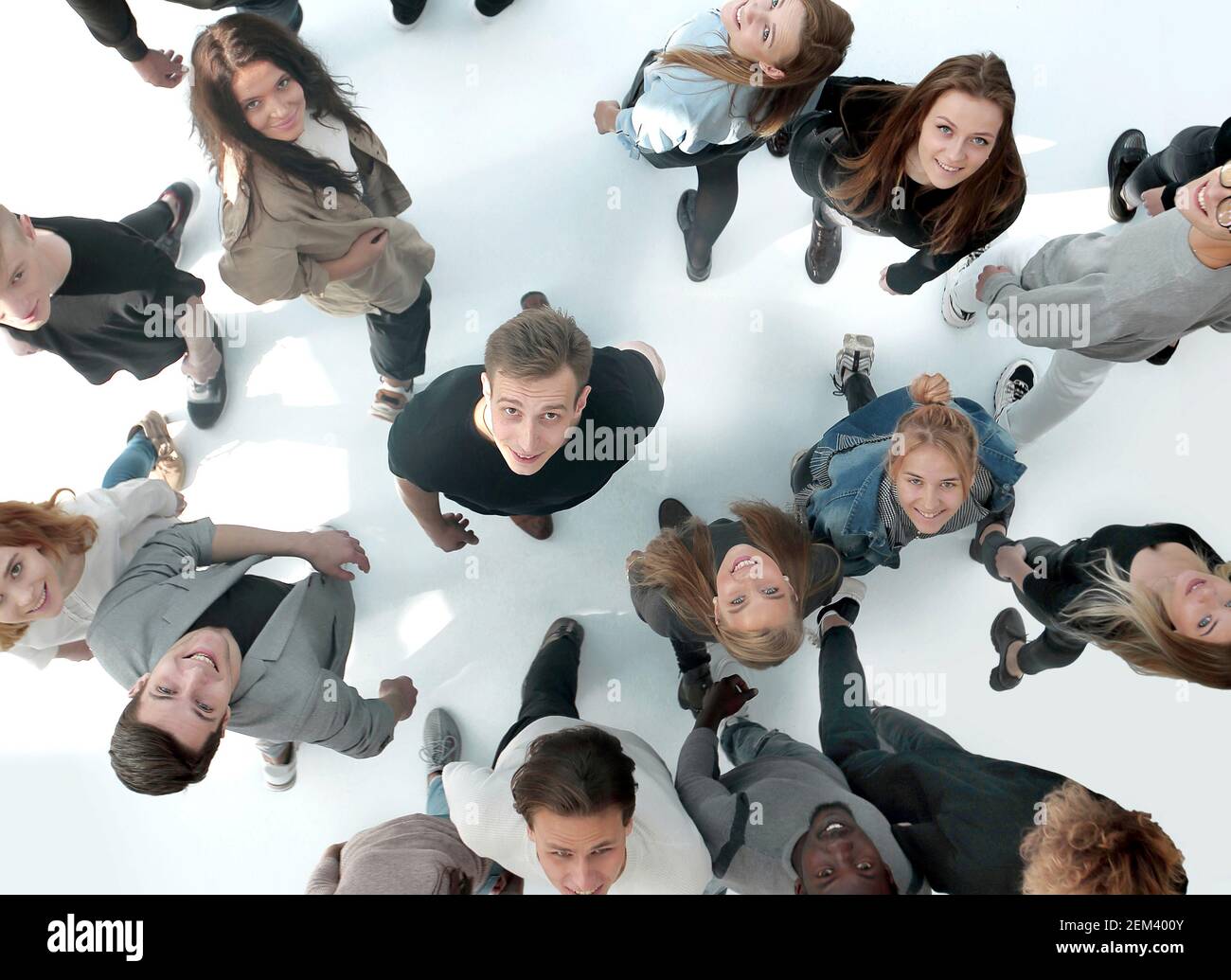 top view. lots of diverse young people looking up Stock Photo - Alamy