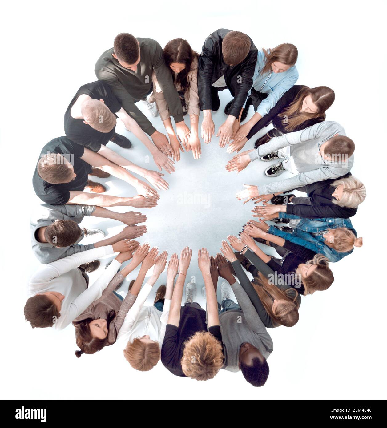 top view . a group of young people joining their palms together Stock ...
