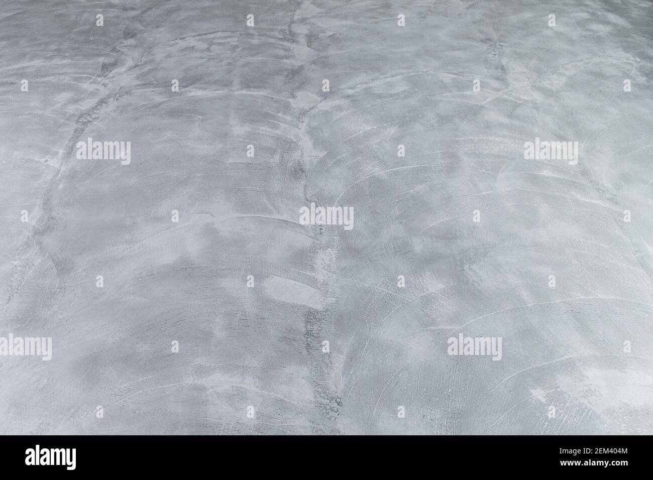 Background of Microcement grey floor with defects due to human errors ...