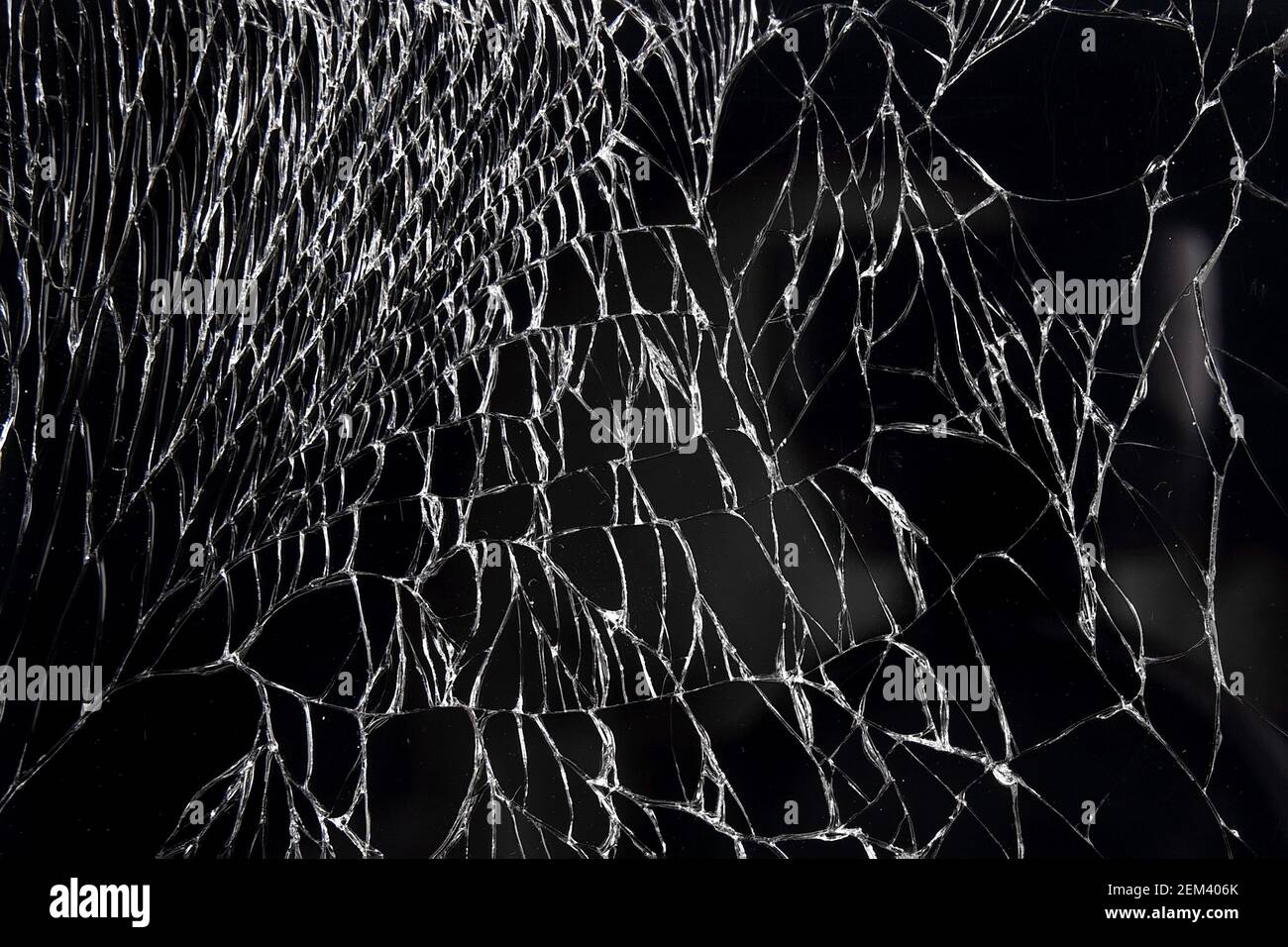 Broken glass display or cracked screen close-up. An empty, flat surface ...