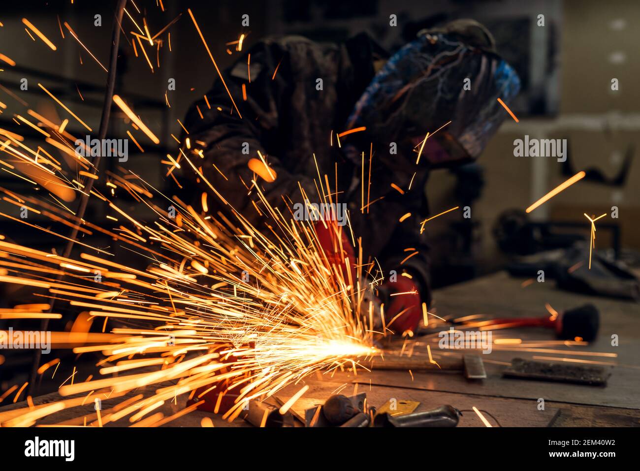 Close up side view of focused professional industrial worker with ...