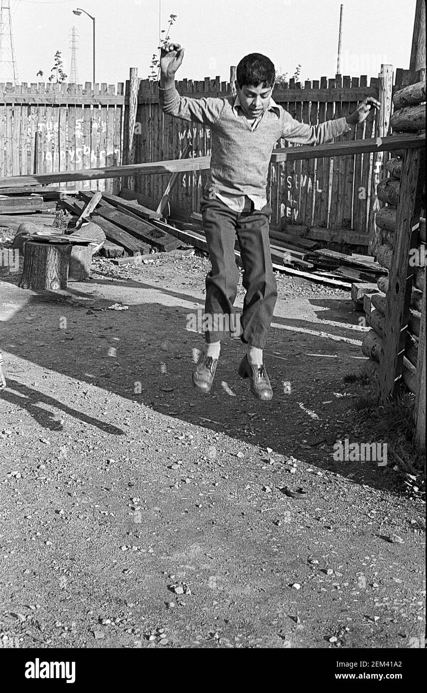 Childrens Adventure Playground asian boy jumping down of plank Stock ...