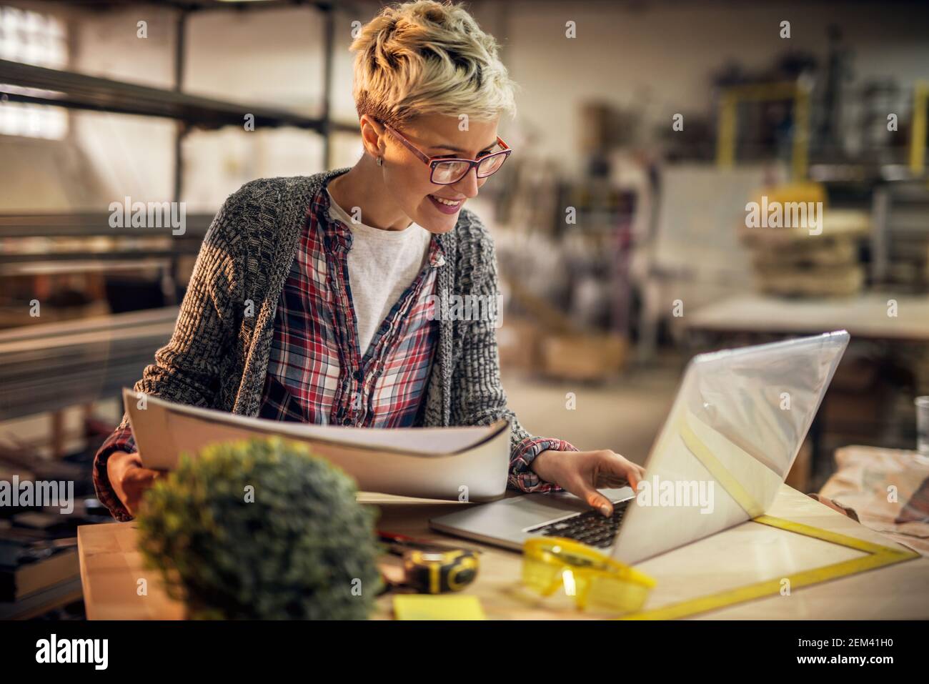 Close up view of charming smiling motivated short hair attractive ...