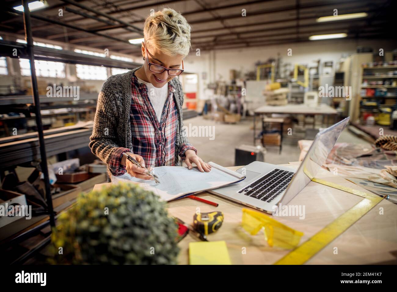Close up view of charming smiling motivated short hair attractive ...