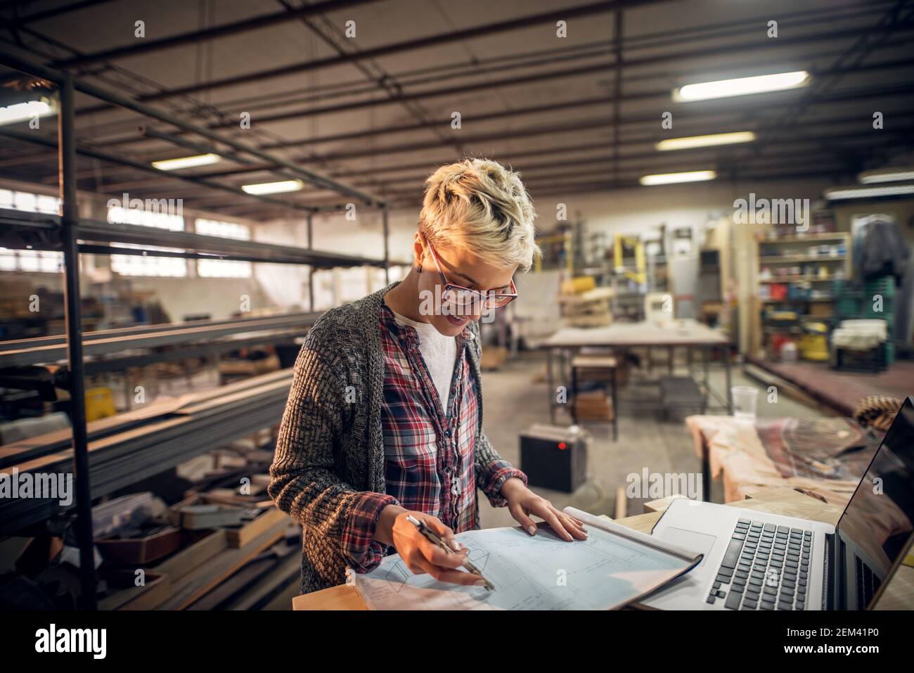 Close up view of charming smiling motivated short hair attractive ...