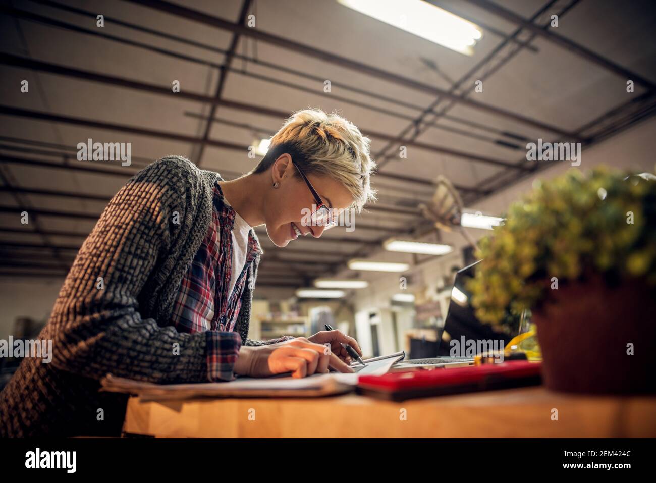 Close up view of charming smiling motivated short hair attractive ...