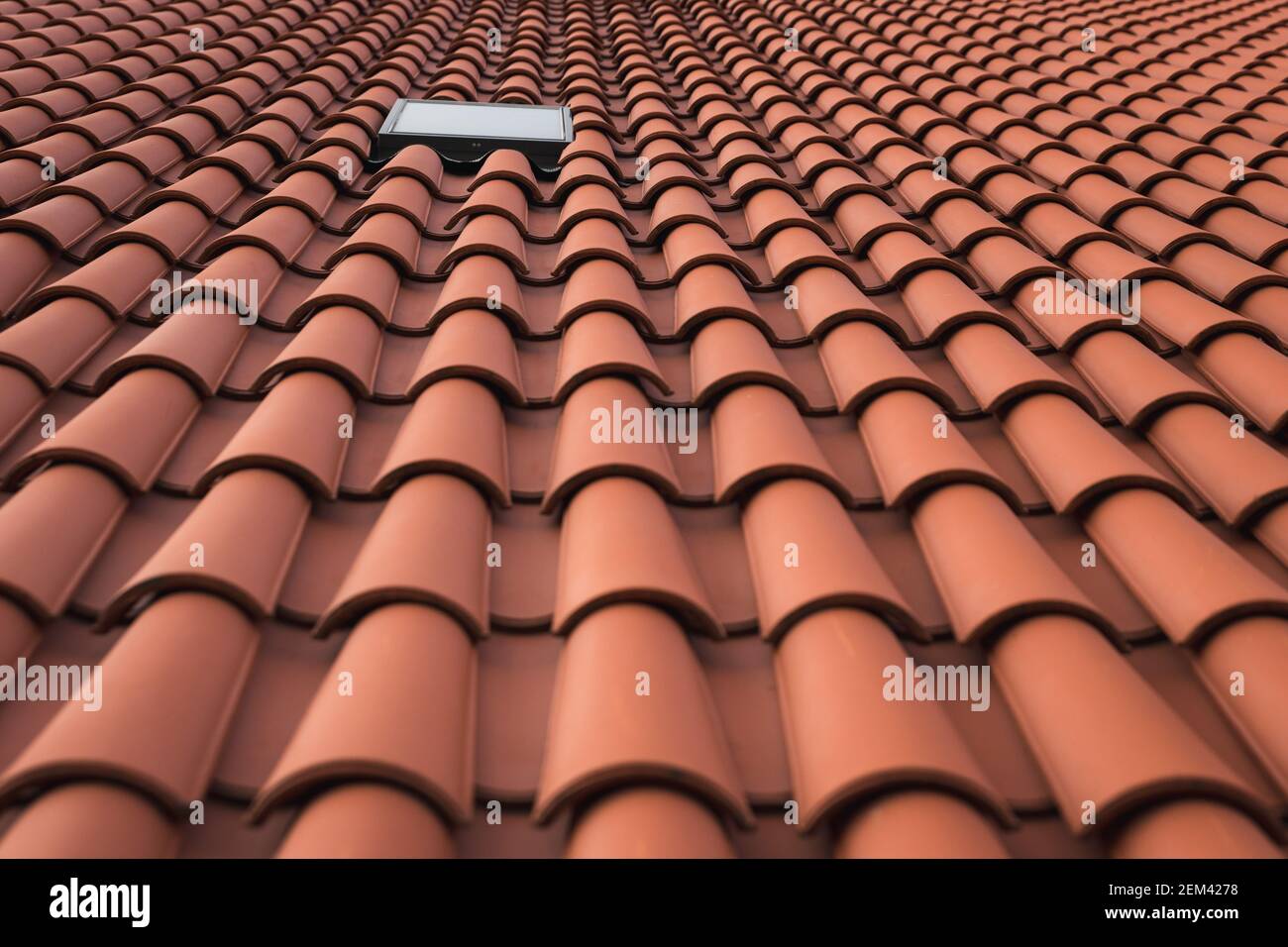 Roof with traditional polish tile and roof window Stock Photo - Alamy