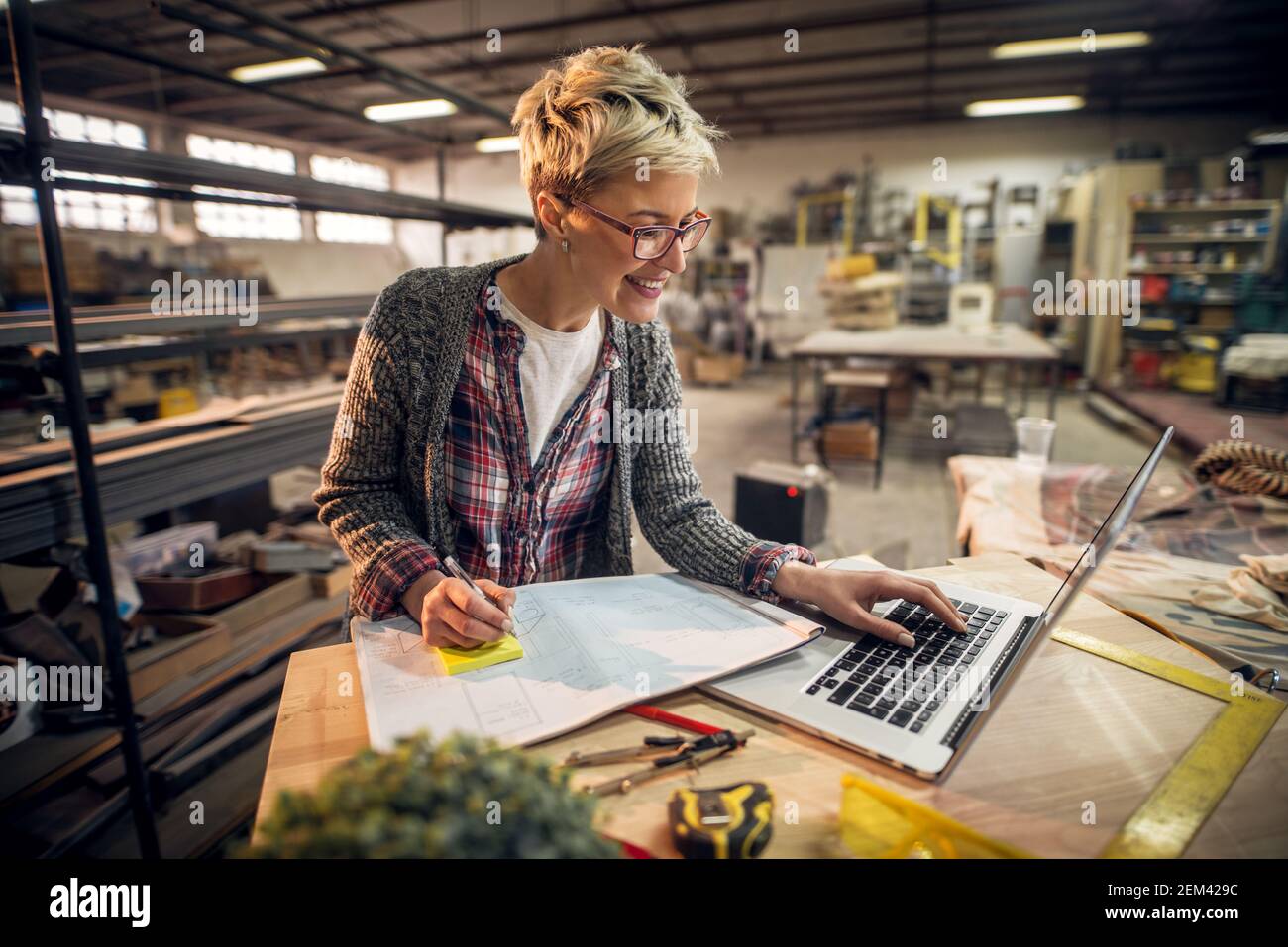 Close up view of charming smiling motivated short hair attractive ...