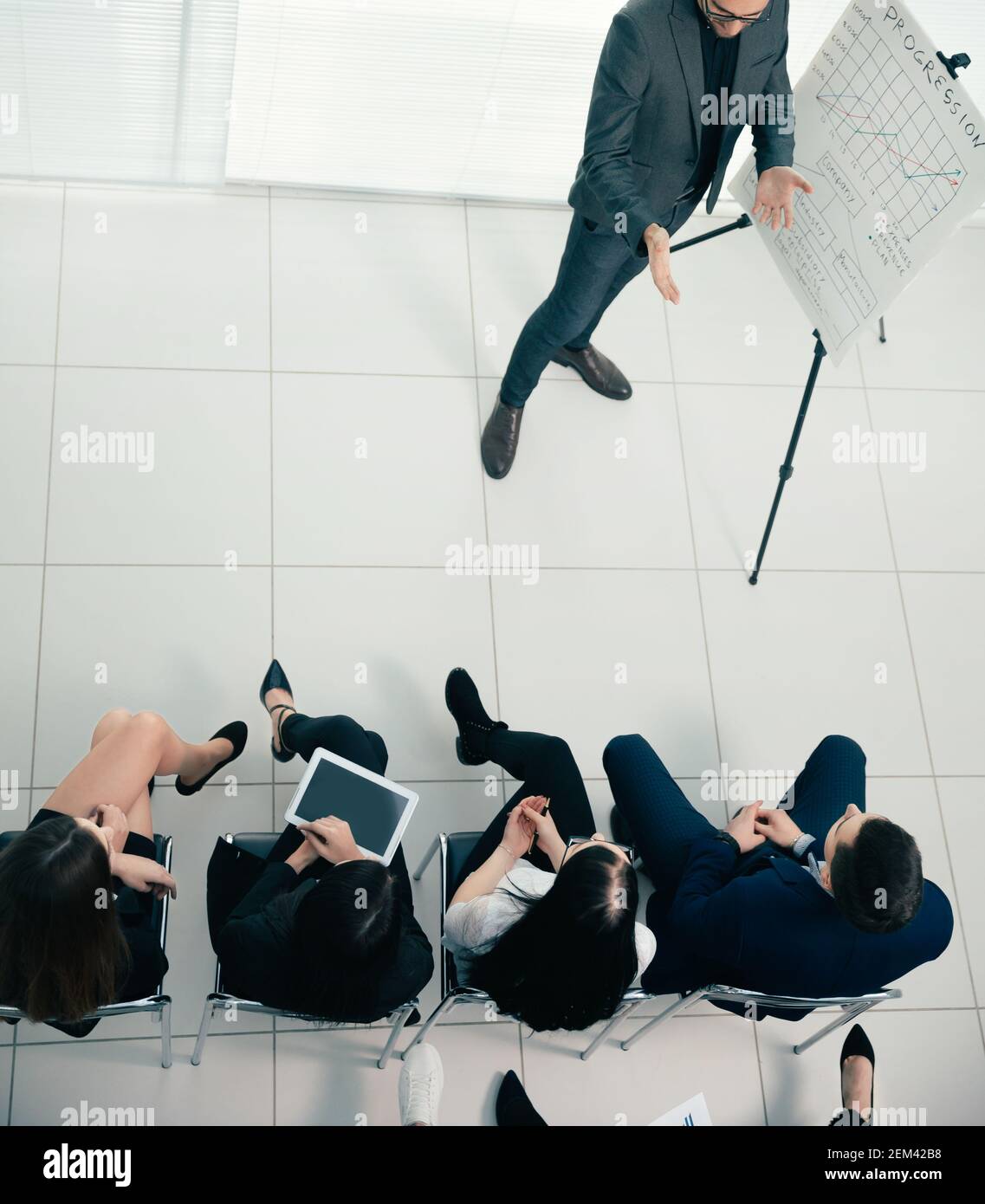 speaker asks questions during the business presentation Stock Photo - Alamy